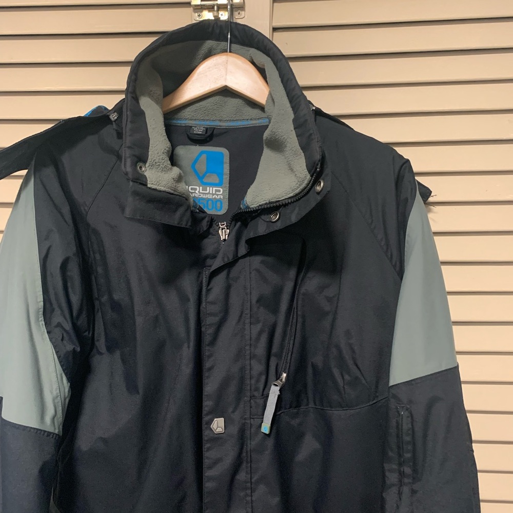 Liquid V.2500 Snowboard Jacket. Black And Blue In Col… - Gem